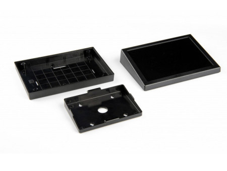 Plastic enclosures for desktop and keyboard electronic devices